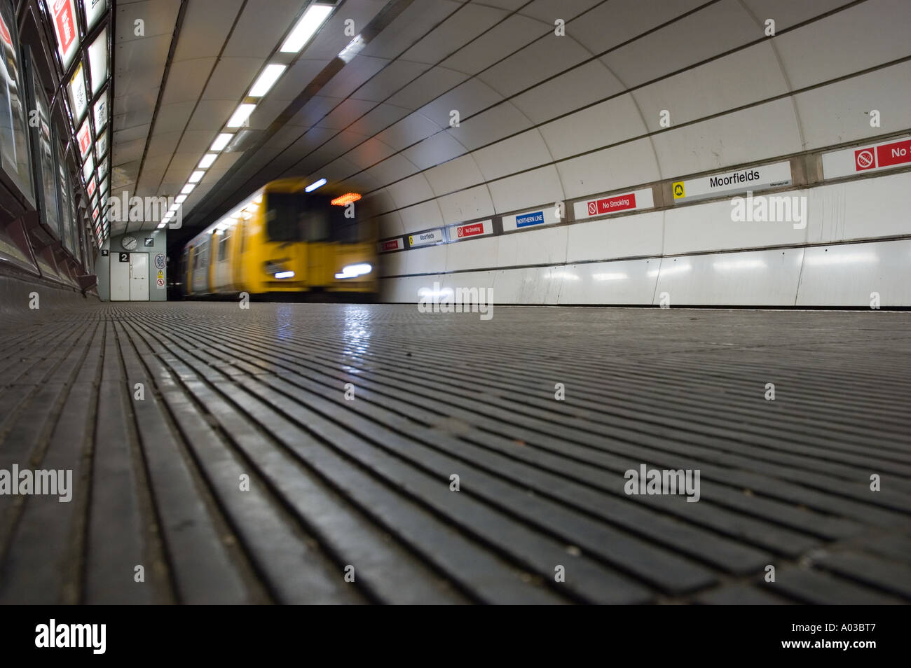 Train emerging from a rail tunnel at Moorfields Railway station on the ...