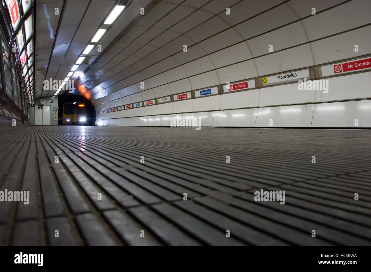 Train arriving on an empty platform at Moorfields Railway station on ...