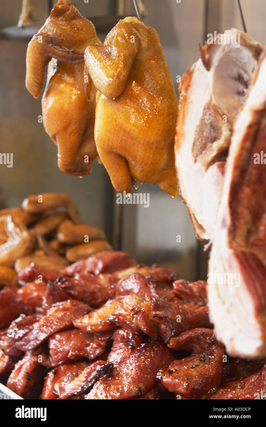 Chicken Hanging Up In Shop Stock Photo - Alamy