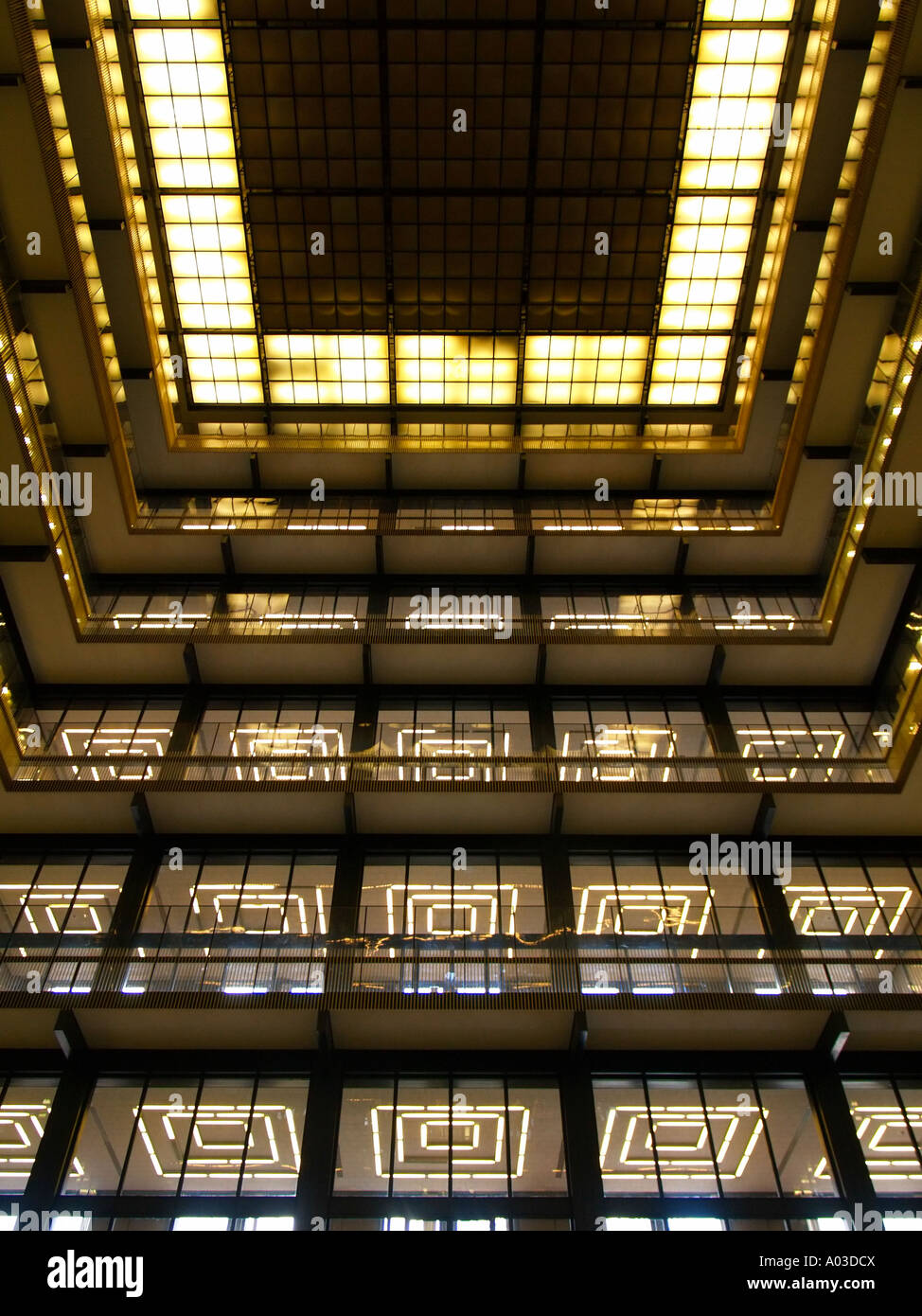 Terraced floors, glass walls, and interior lighting inside the foyer of ...