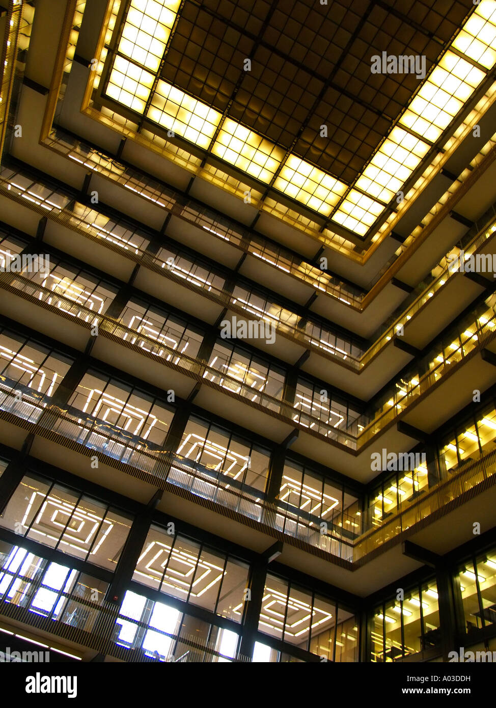 Terraced floors, glass walls, and interior lighting inside the foyer of ...