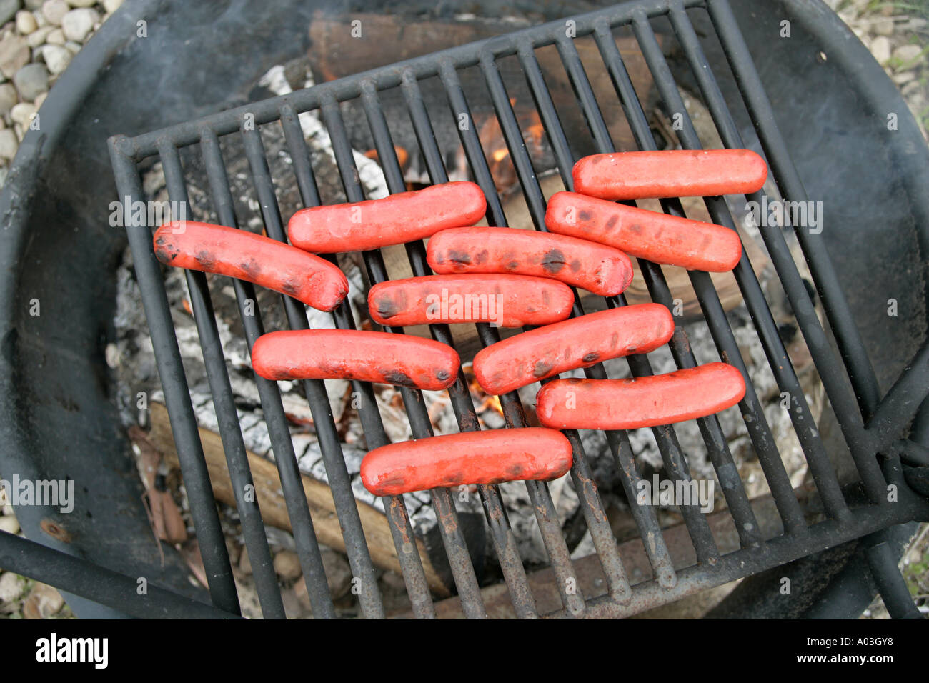 Hot dogs on the grill Stock Photo - Alamy