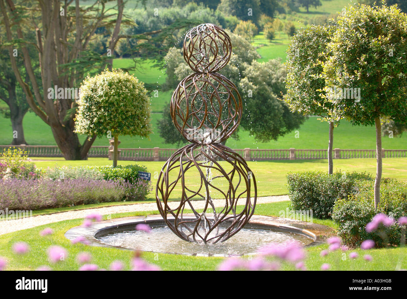 THE TOPIARY WATER SCULPTURE BY GILES RAYNER IN THE MILLENNIUM GARDEN AT ...