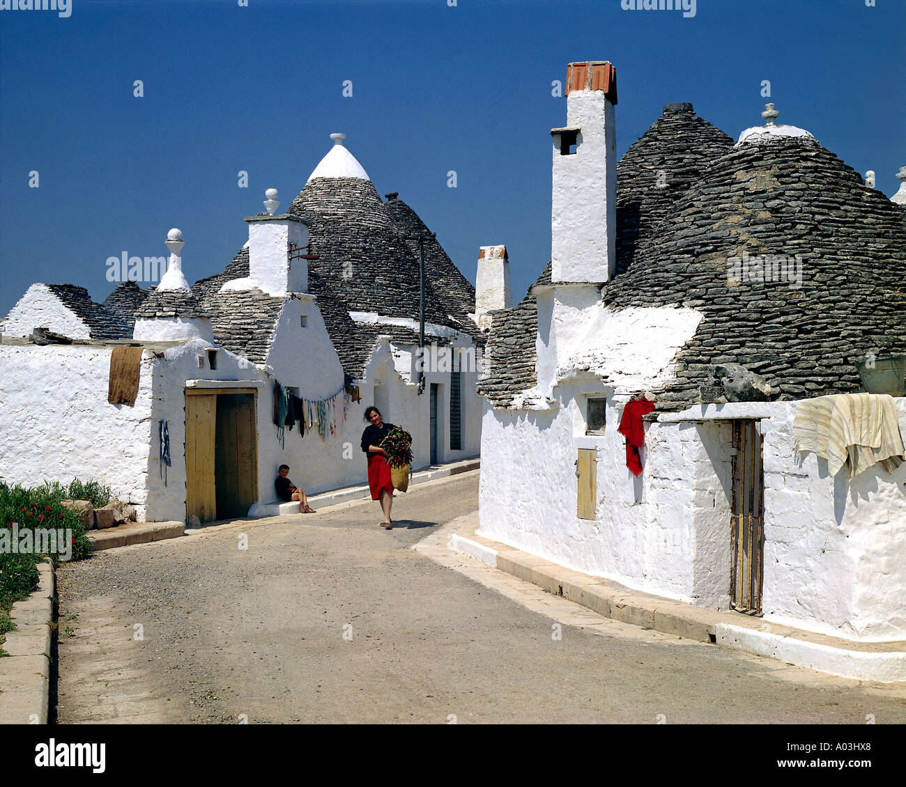 IT - APULIA: Typical Trulli Houses at Alberobello Stock Photo - Alamy