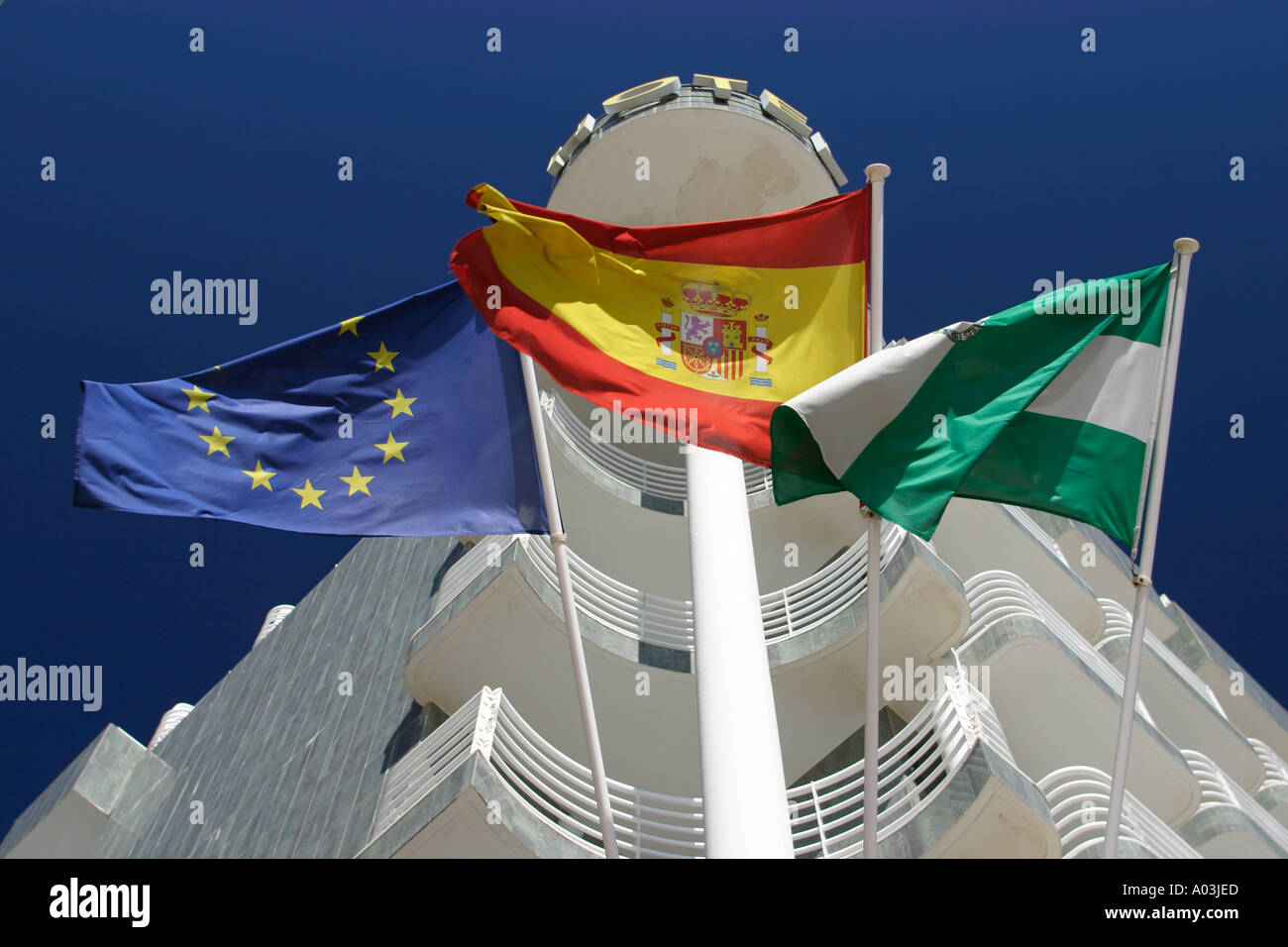 hotel flags blowing in the wind Stock Photo - Alamy