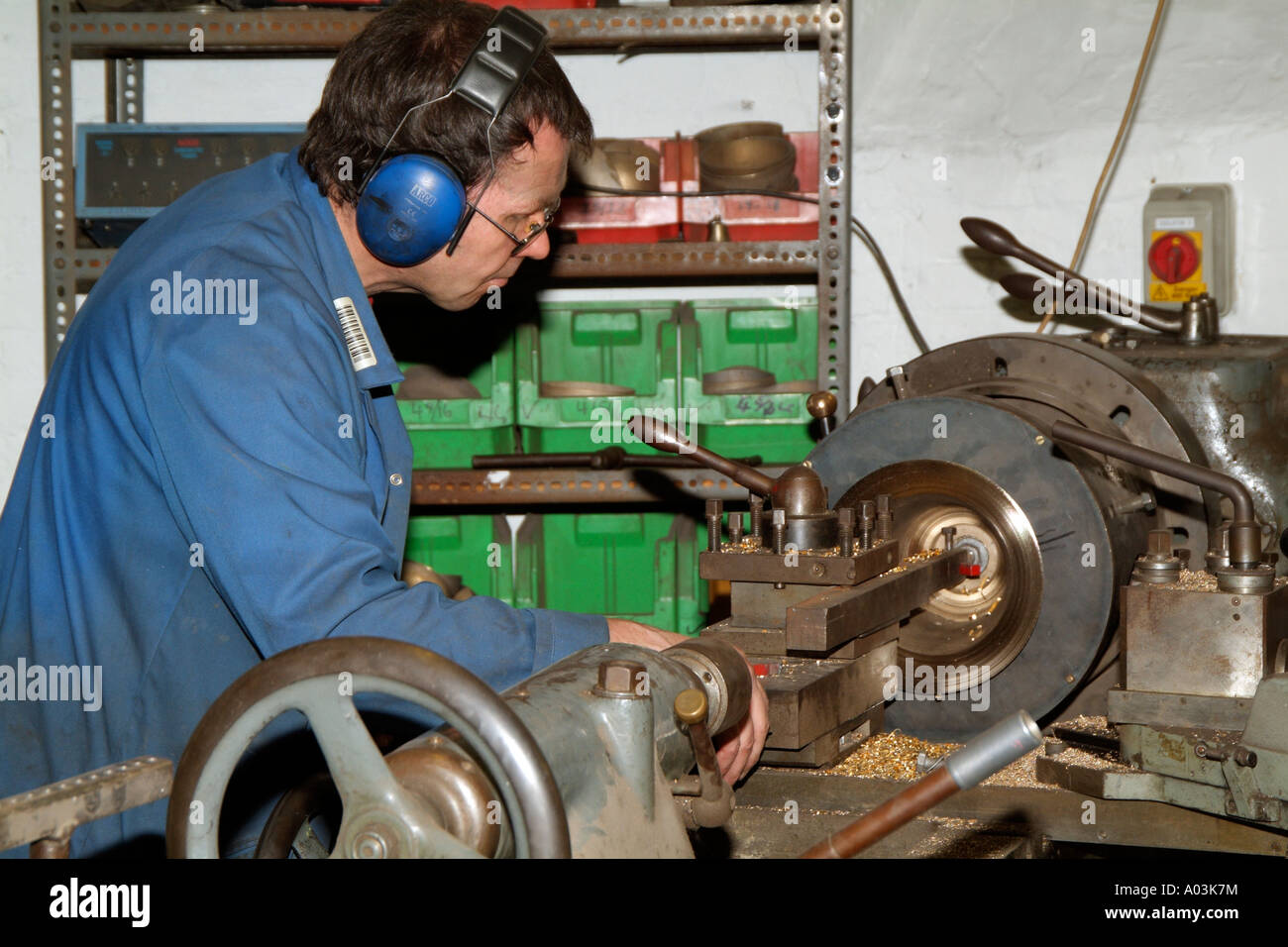 Bell manufacturing. Turning bell on a lathe to aid tuning. Whitechapel ...