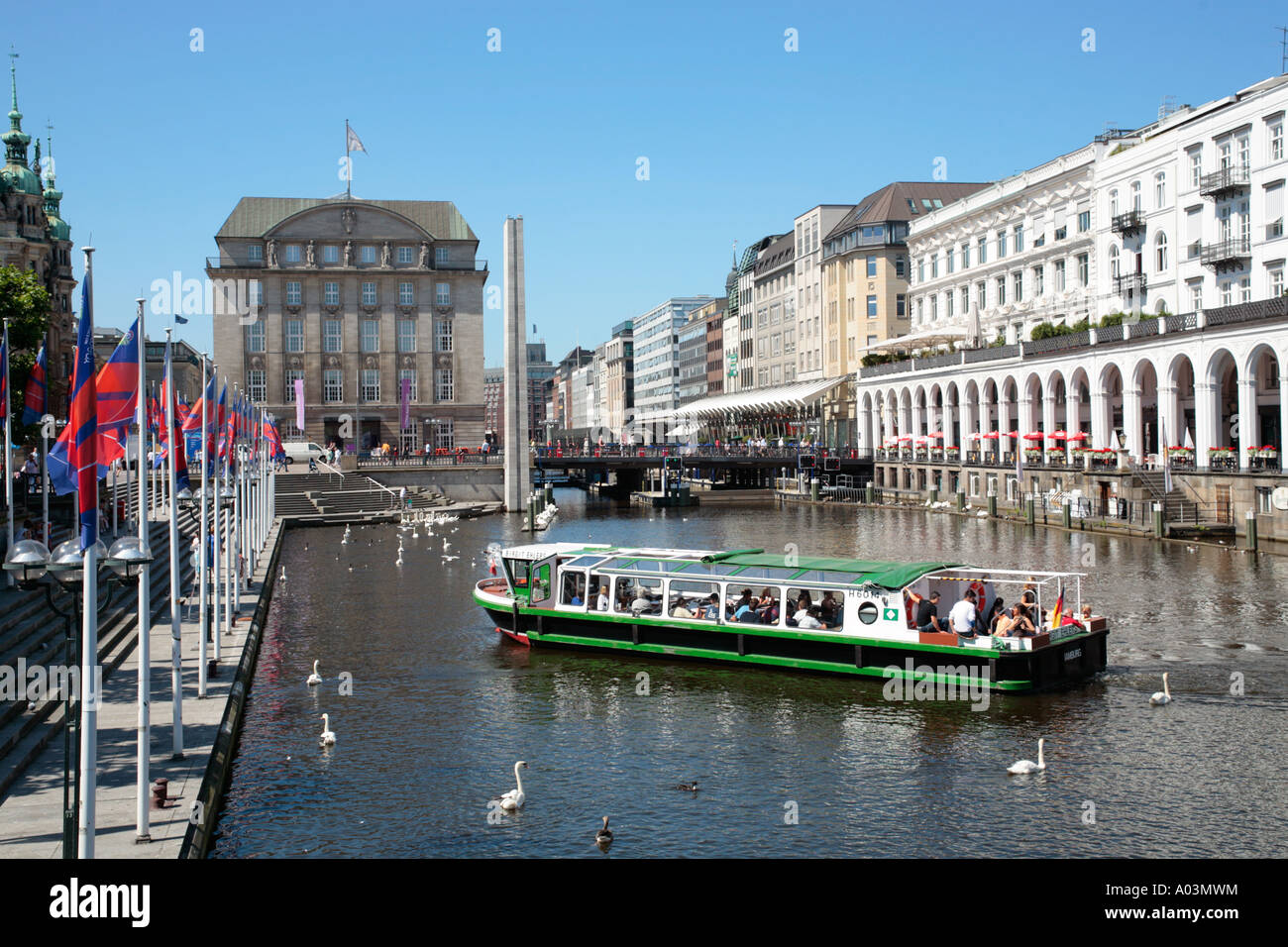 passenger ship on Alsterfleet in front of the Alster Arcades in Hamburg ...