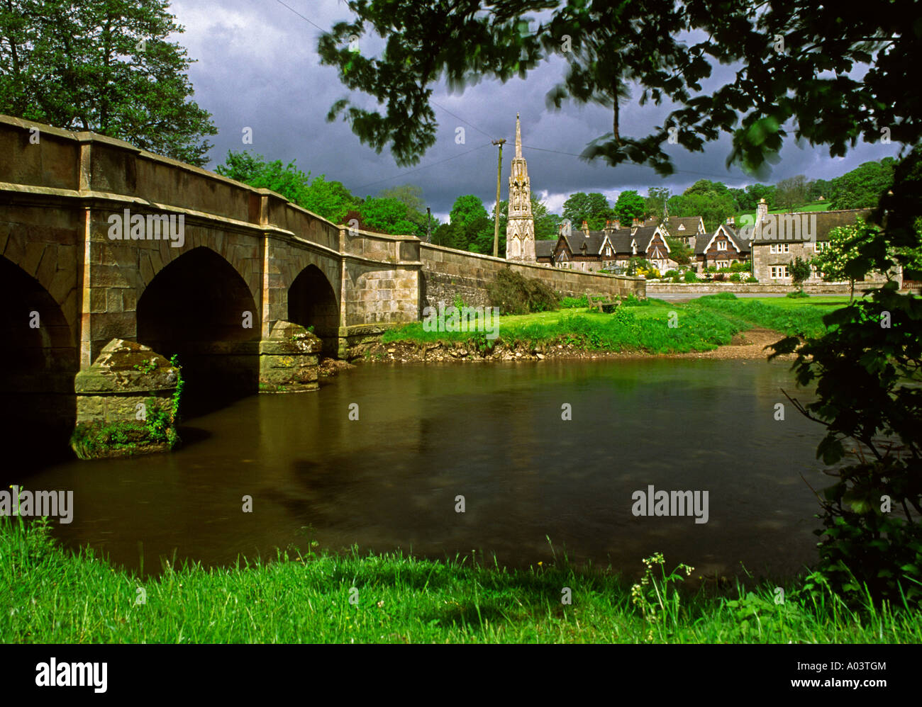 View of the bridge and river at Ilam in the Staffordshire Peak District ...