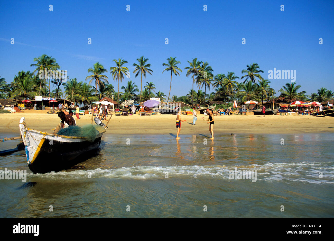 india goa a fishing boat on baga beach Stock Photo - Alamy