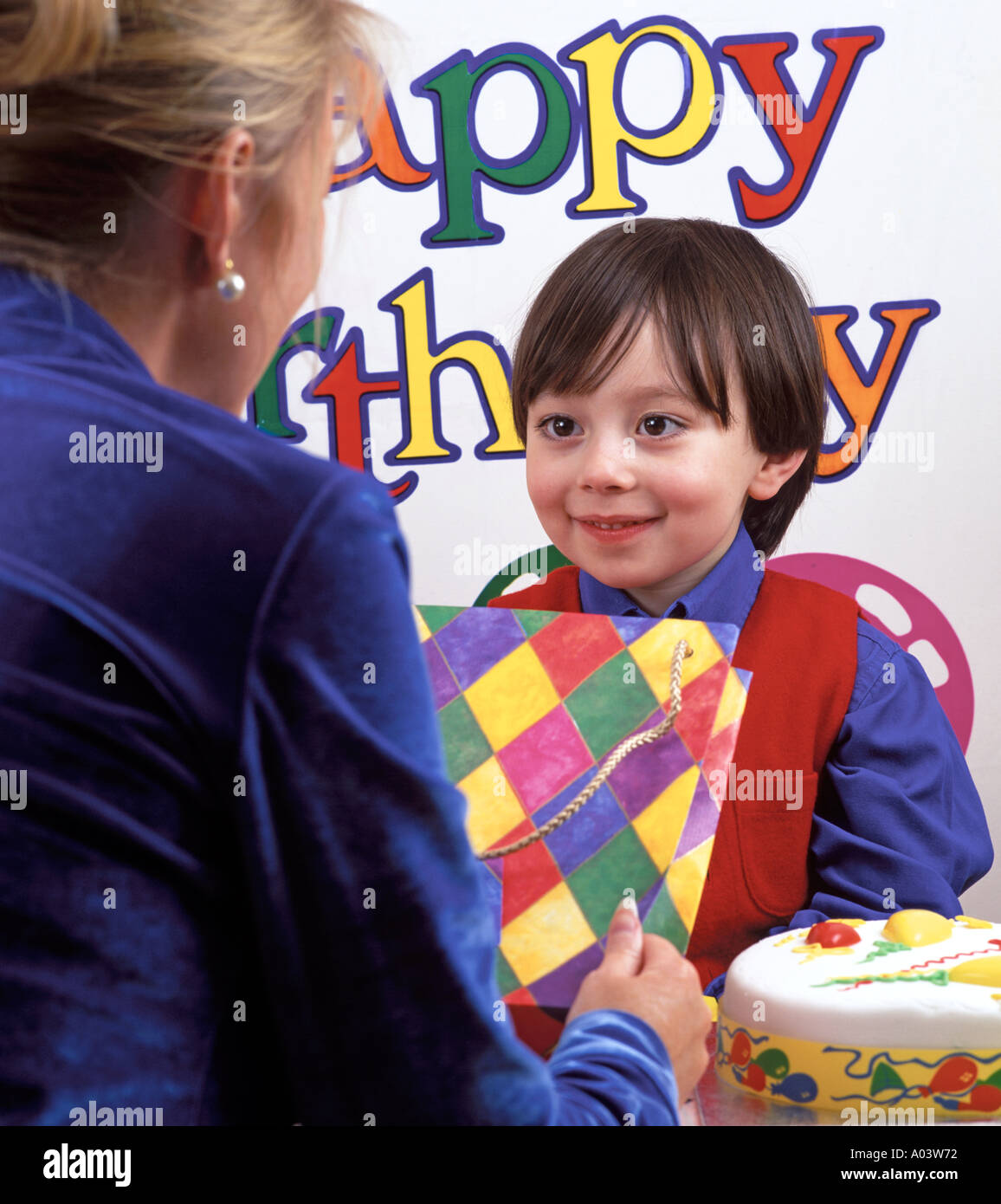 Mum giving birthday cake hi-res stock photography and images - Alamy