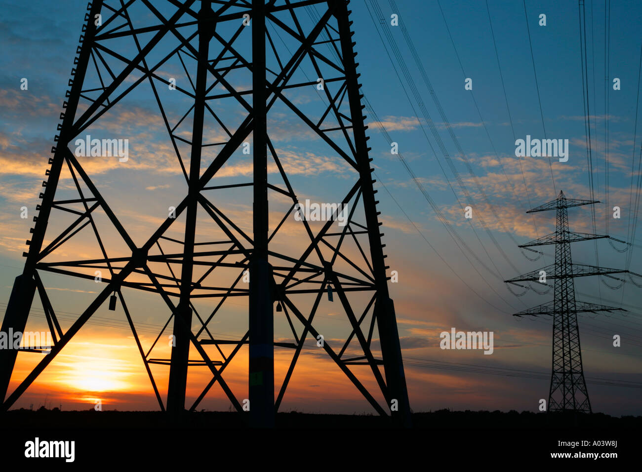 Electricity poles sunset silhouette hi-res stock photography and images ...