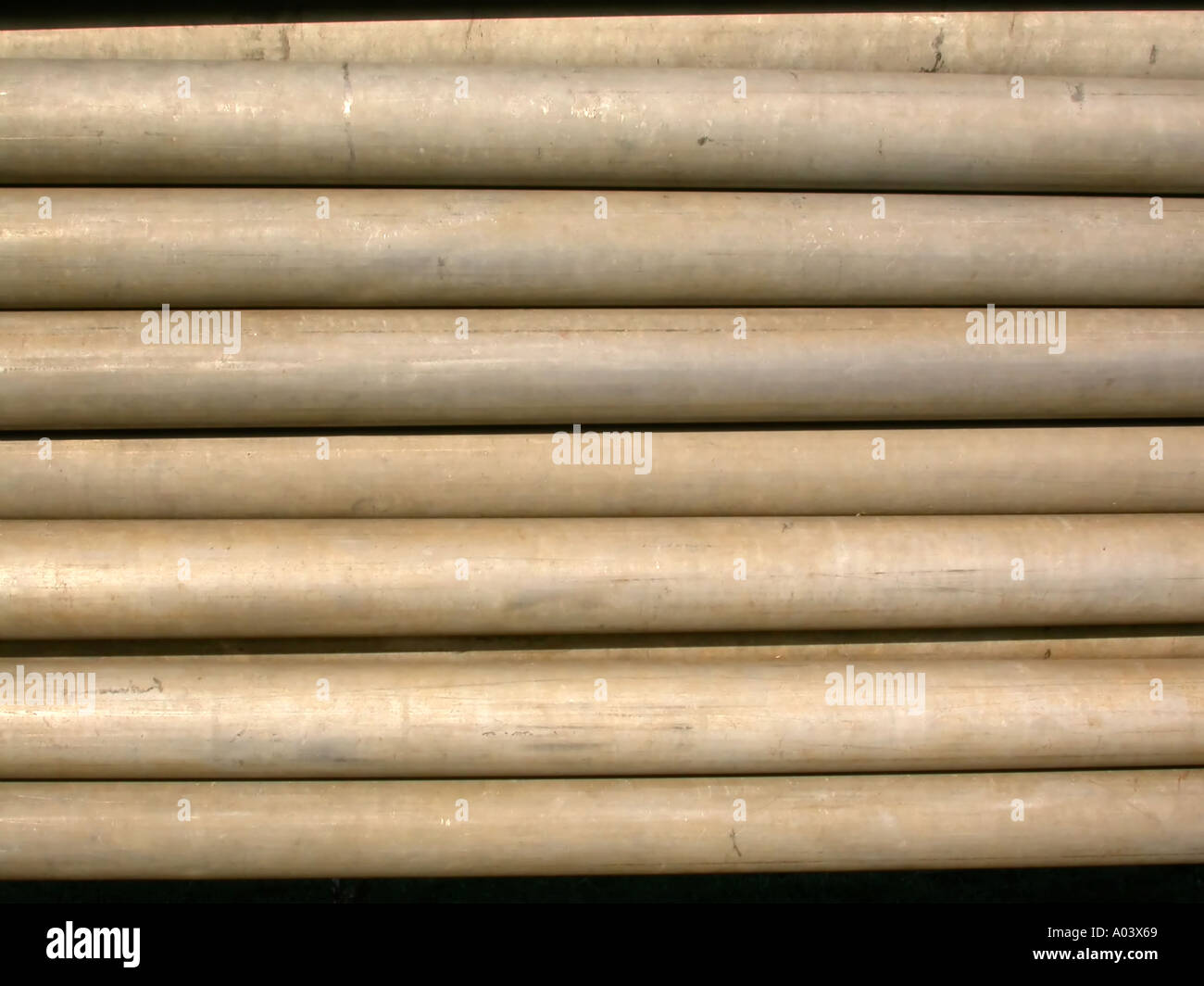 Steel pipe stacked horizontally Stock Photo - Alamy