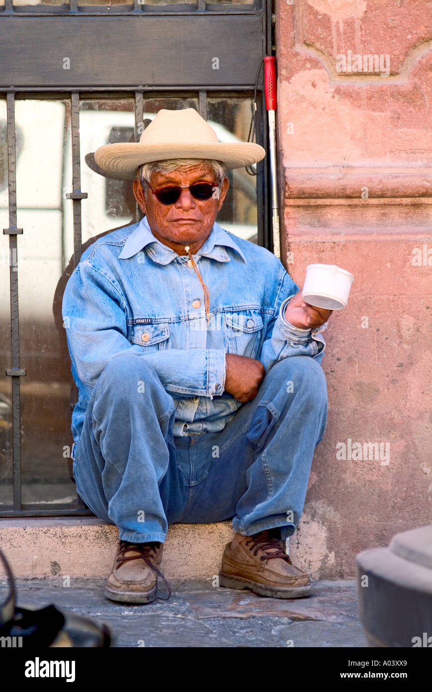 Blind man begging on streets on San Miguel de Allende Mexico Stock ...