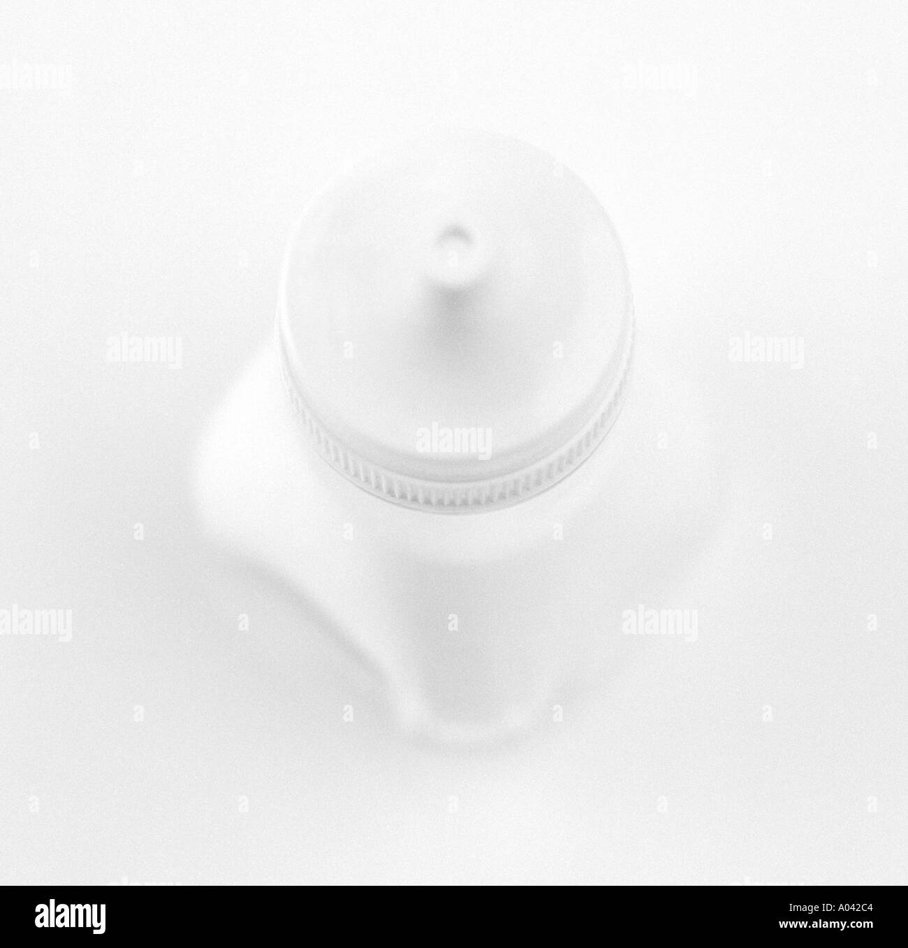 Salt shaker on white background in soft focus Stock Photo - Alamy