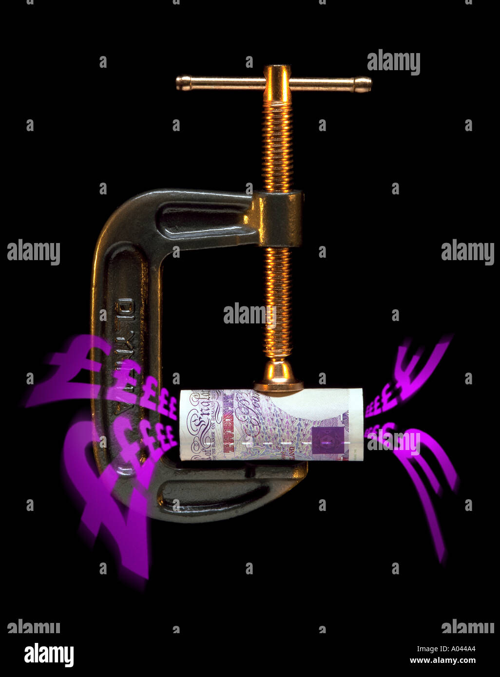 Cash squeeze: conceptual image of rolled up £20 notes in a G-Clamp ...