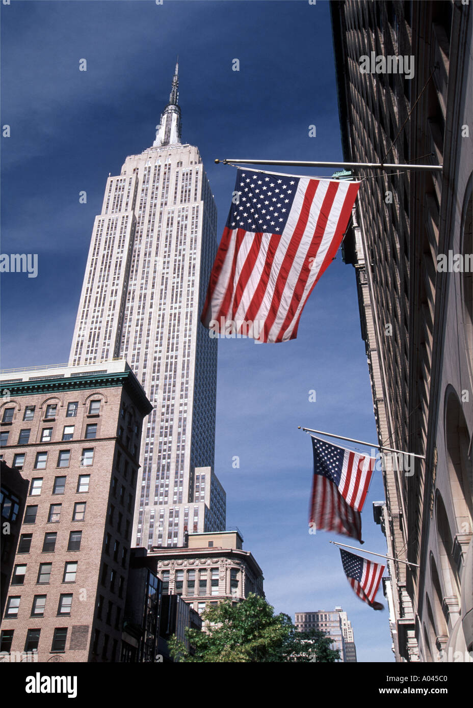 Empire State Building and US Flags New York City USA Stock Photo - Alamy