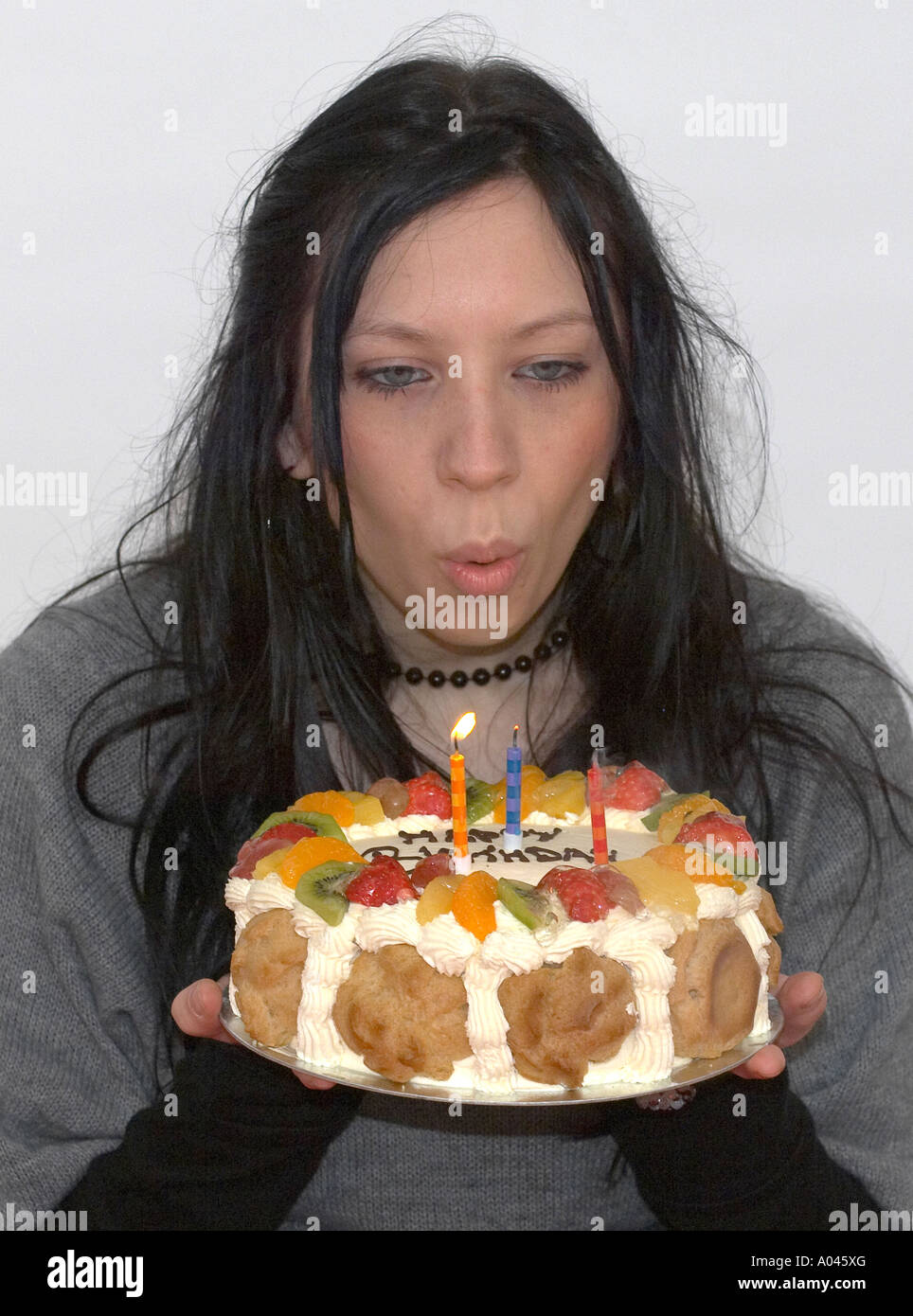 Blowing cake hi-res stock photography and images - Alamy