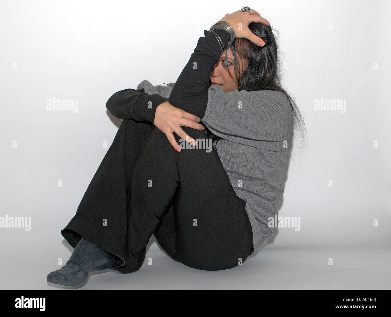 Distressed young woman Stock Photo - Alamy