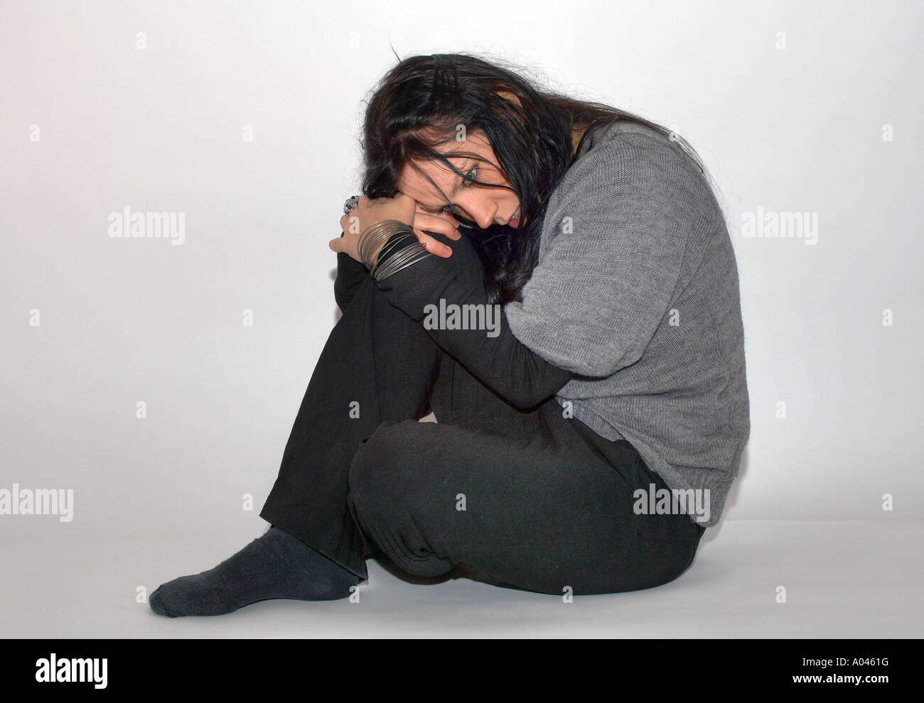 Distressed young woman Stock Photo - Alamy
