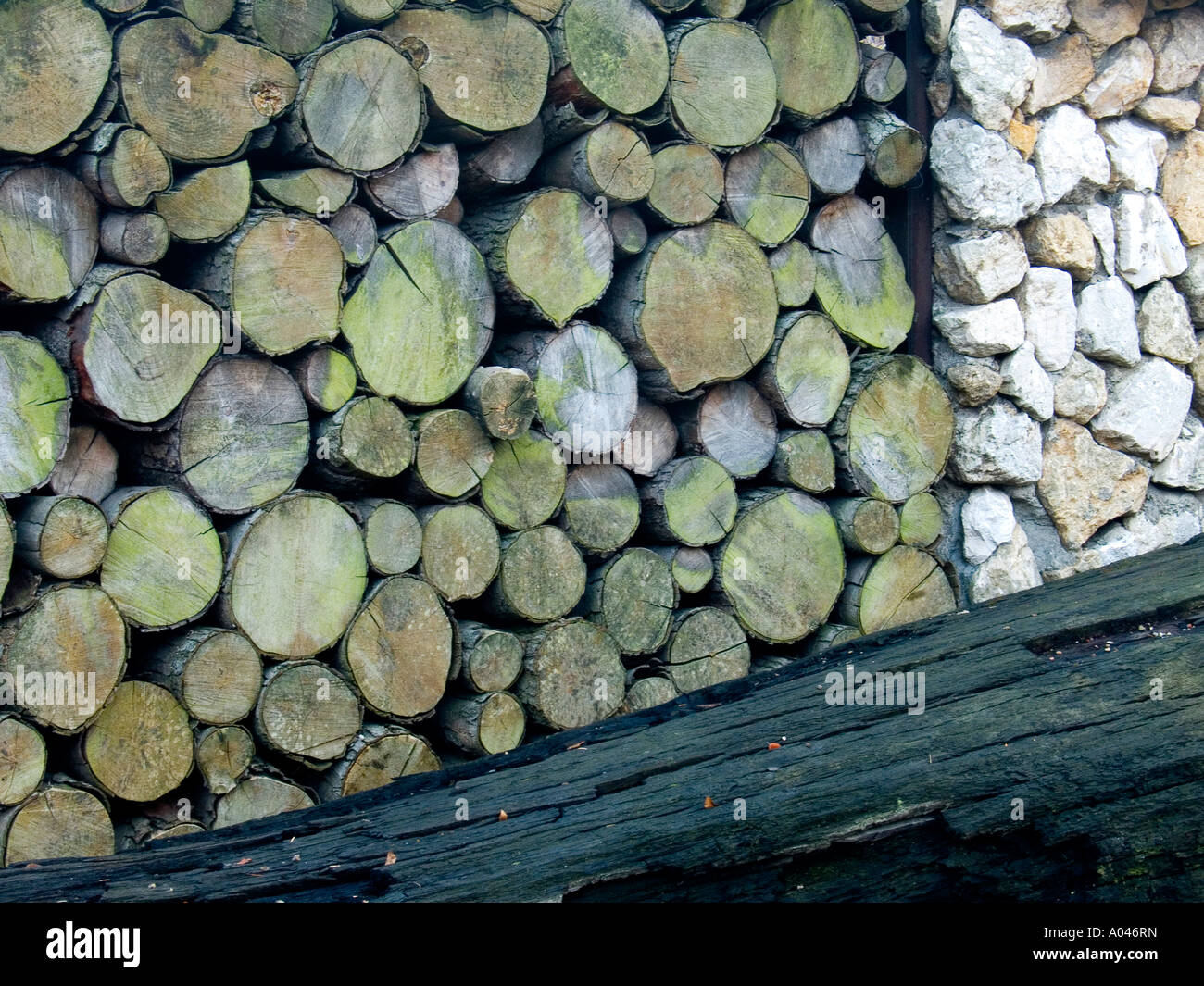 Timberwood and stones Stock Photo - Alamy