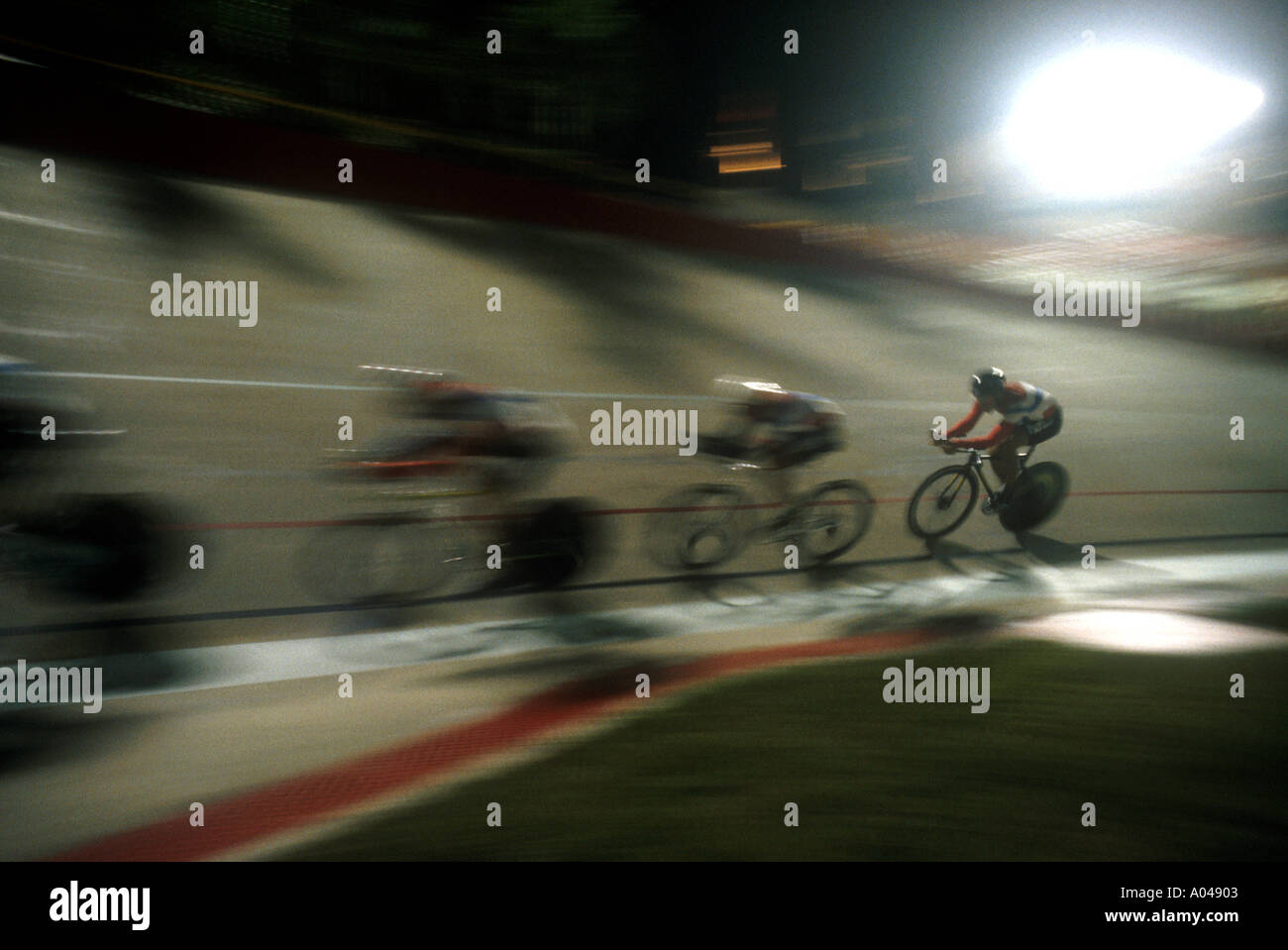 Bicycles racing on a track Stock Photo - Alamy