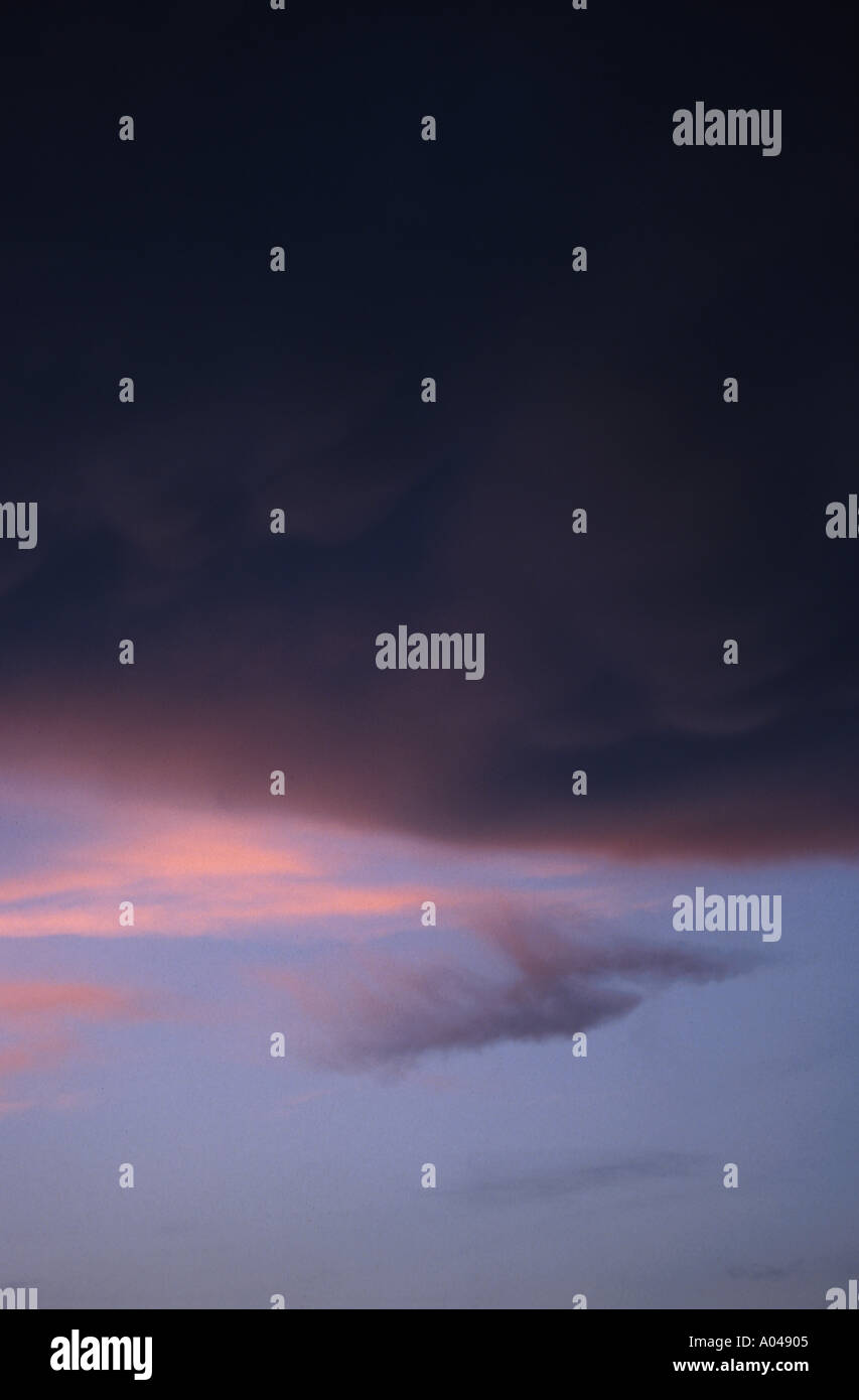 Pink tinged sunset cloud formation Stock Photo - Alamy