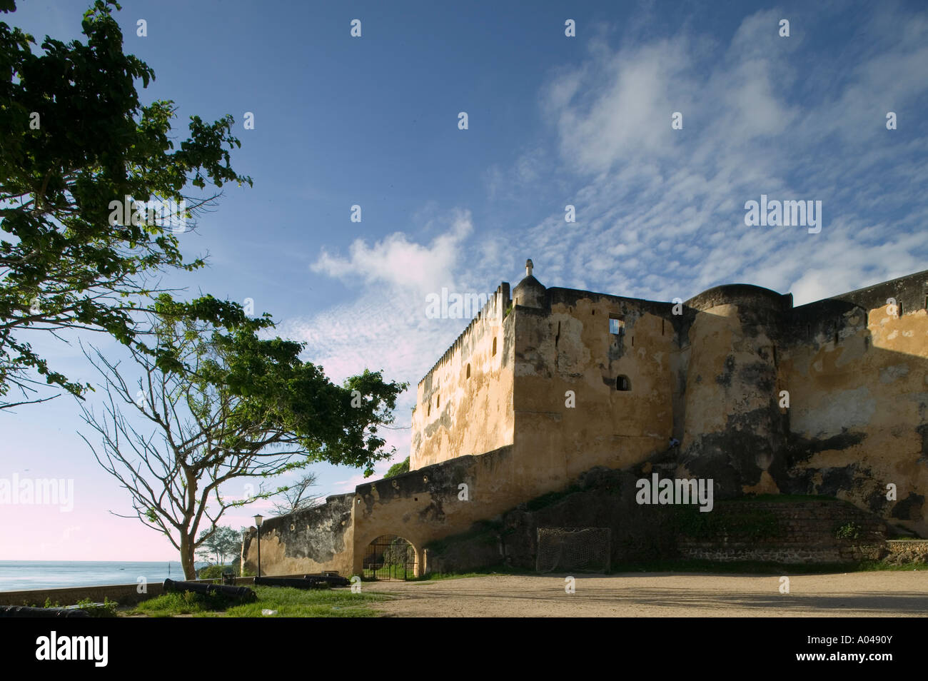 Africa Kenya Mombasa Morning sun lights stone walls of Fort Jesus a ...