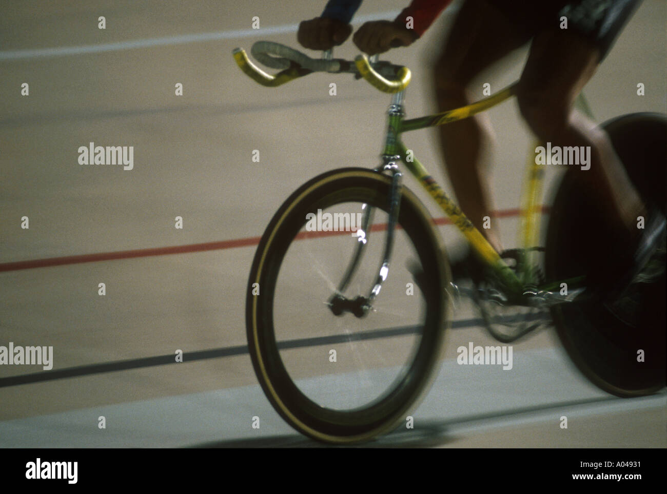 Cyclist racing on track Stock Photo - Alamy