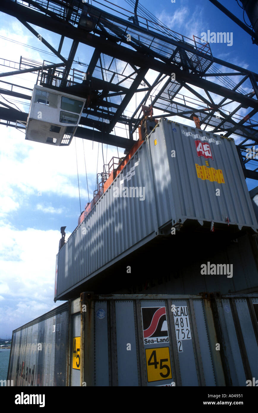 Cargo container being lifted from ship Stock Photo - Alamy