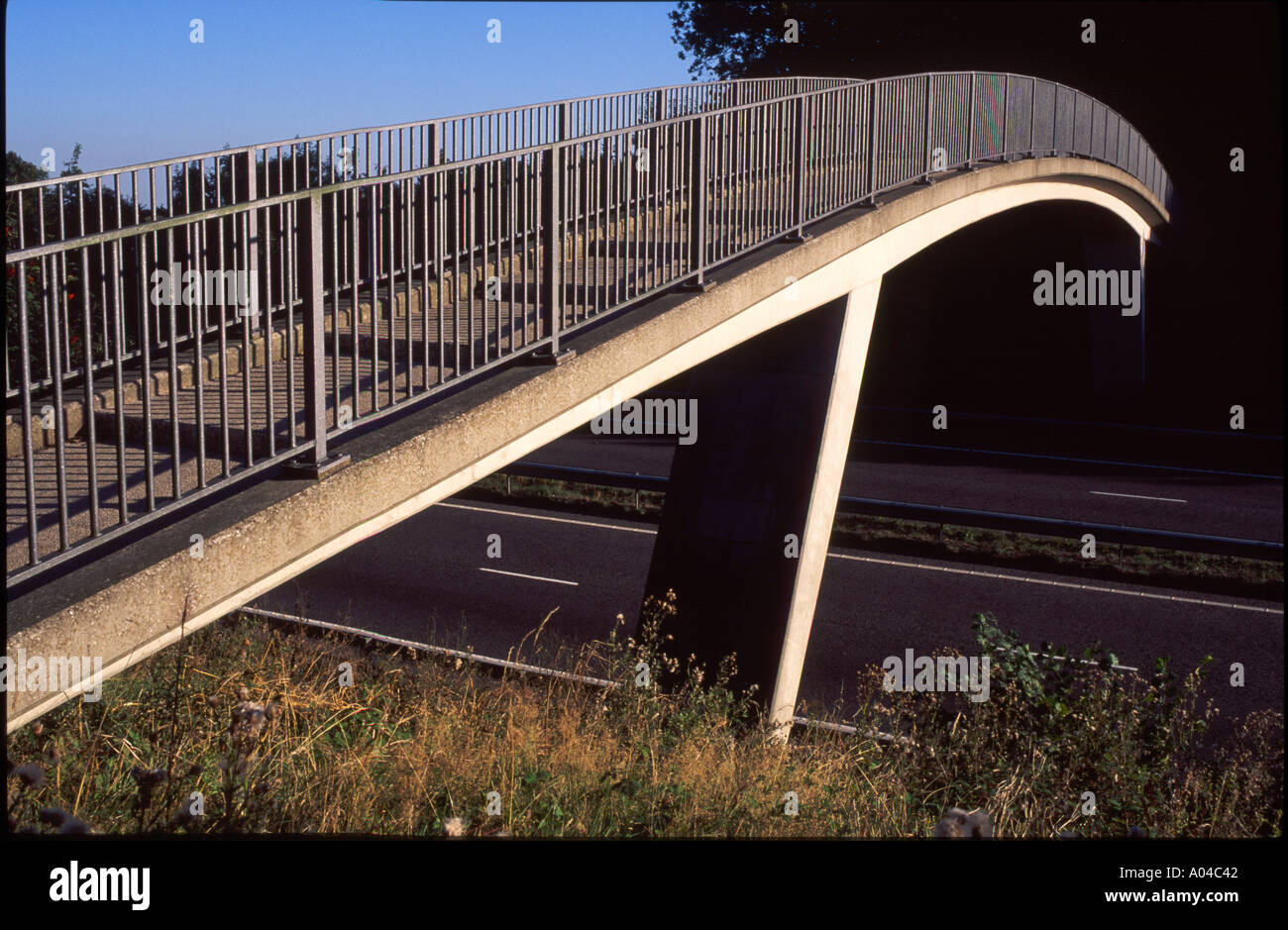 Footbridge over motorway Stock Photo - Alamy