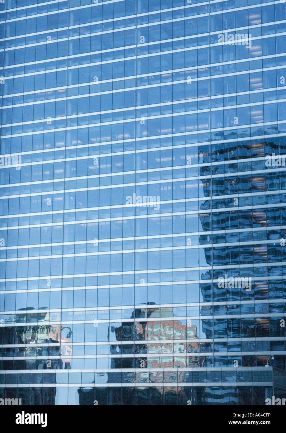High rises reflected on facade of skyscraper Stock Photo - Alamy