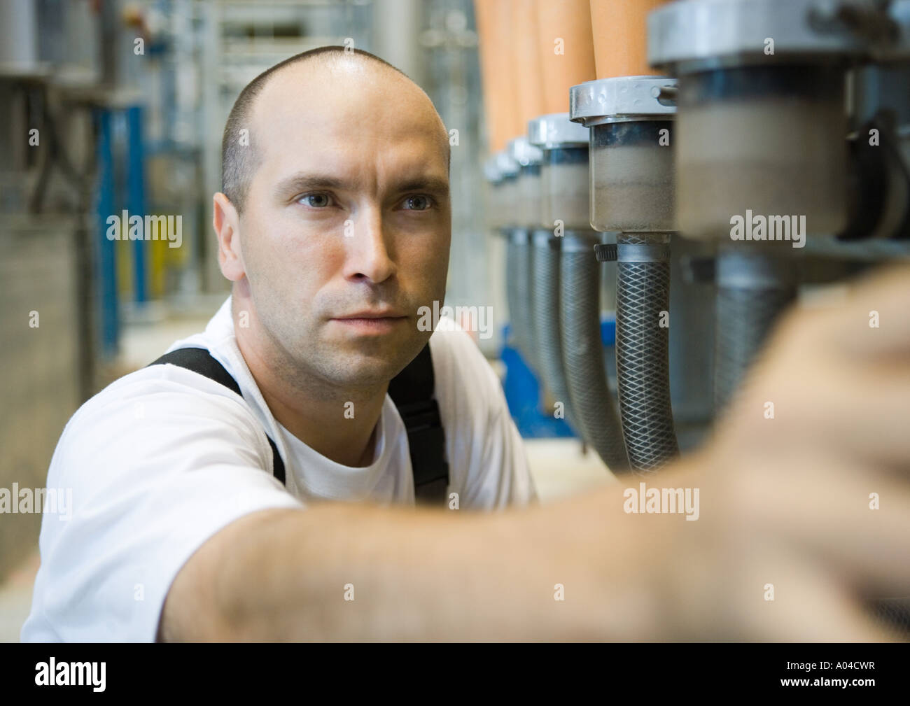 Worker in paper mill Stock Photo - Alamy