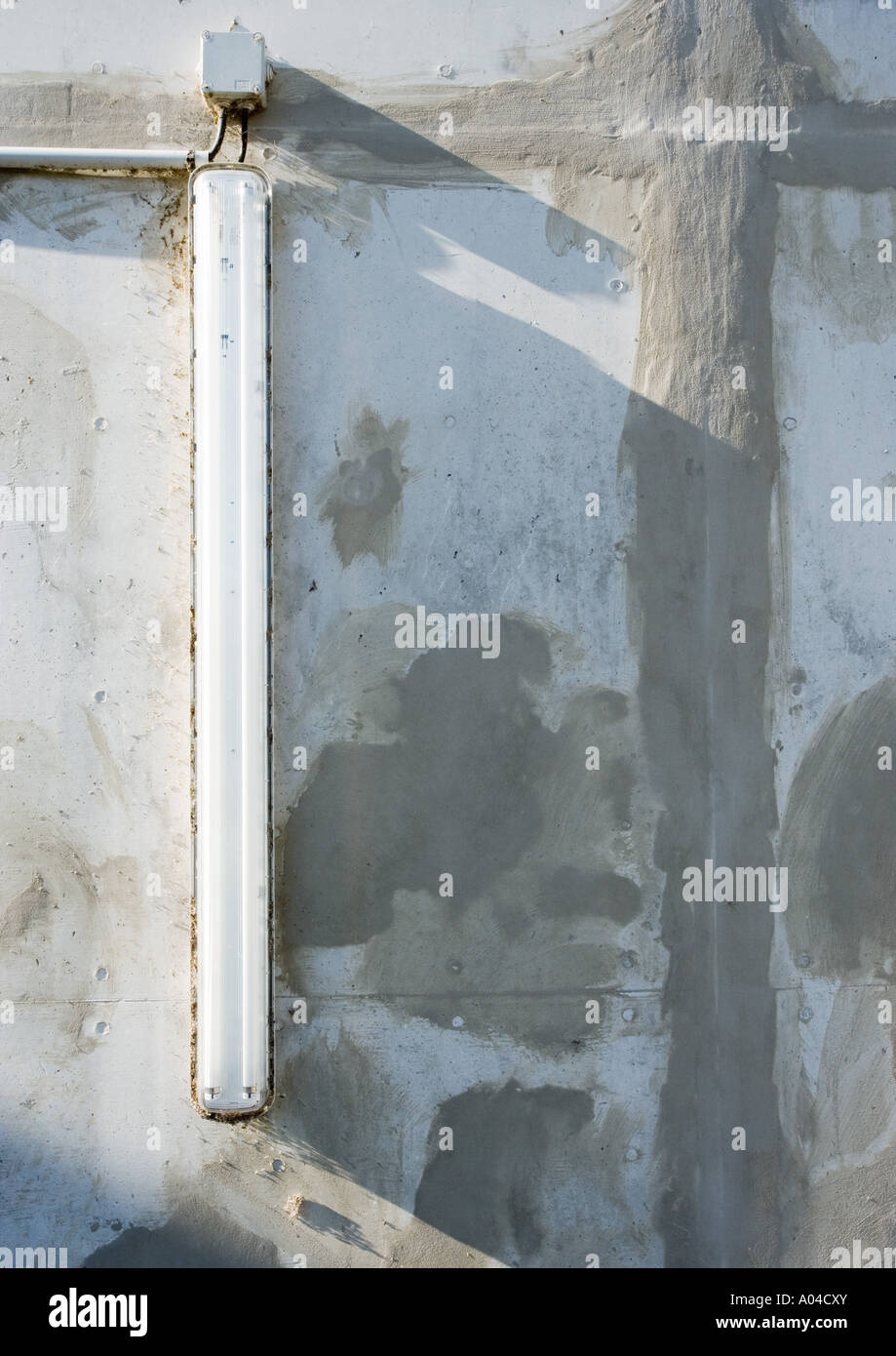Fluorescent light on wall Stock Photo - Alamy