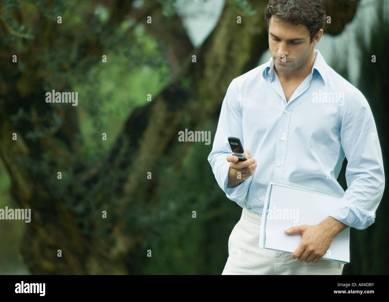 Holds documents young man hi-res stock photography and images - Alamy