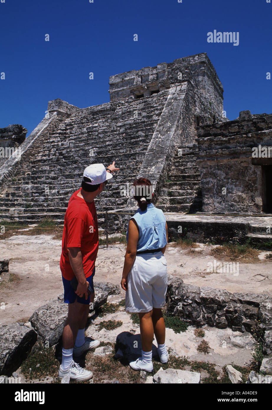 Tourist couple at Tulum Mayan Ruins Mexico Stock Photo - Alamy