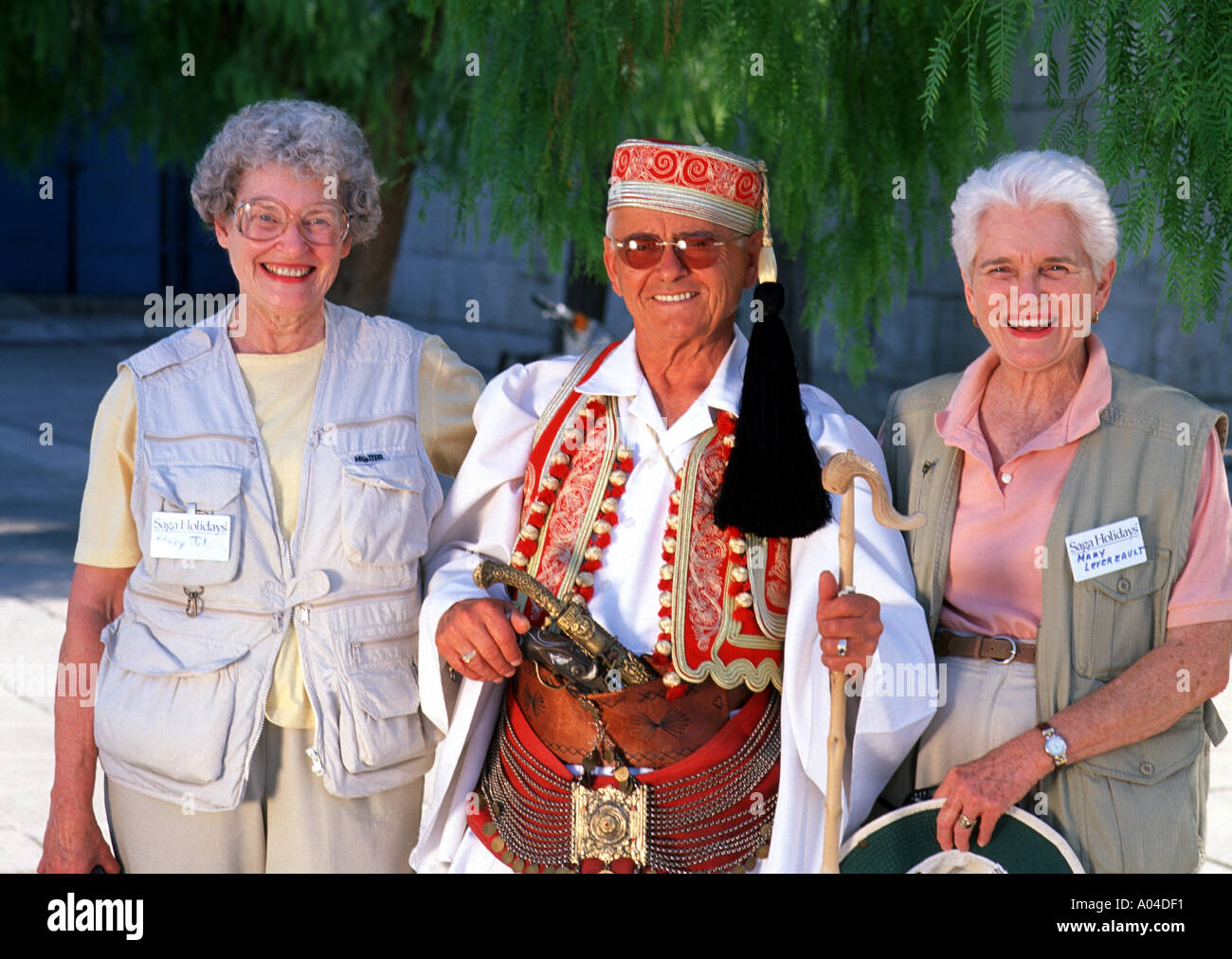 Greek Man in Costume with American Women in Athens Greece Stock Photo ...
