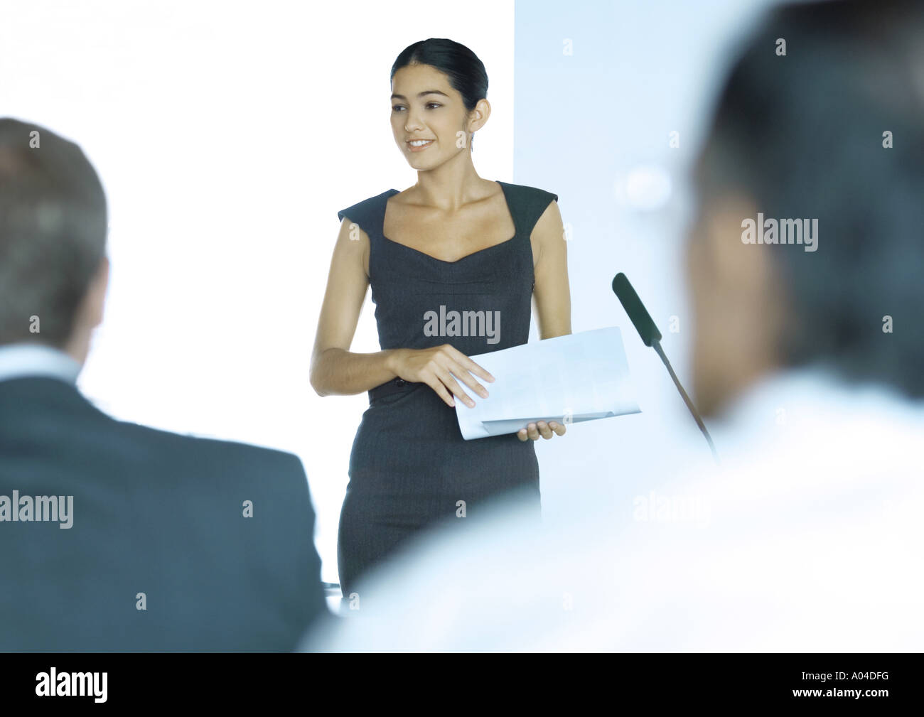 Businesspeople listening speaker during conference hi-res stock ...