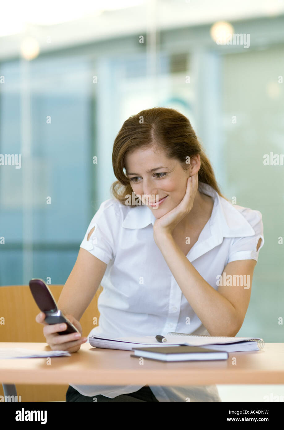 Smiling employees office desks hi-res stock photography and images - Alamy