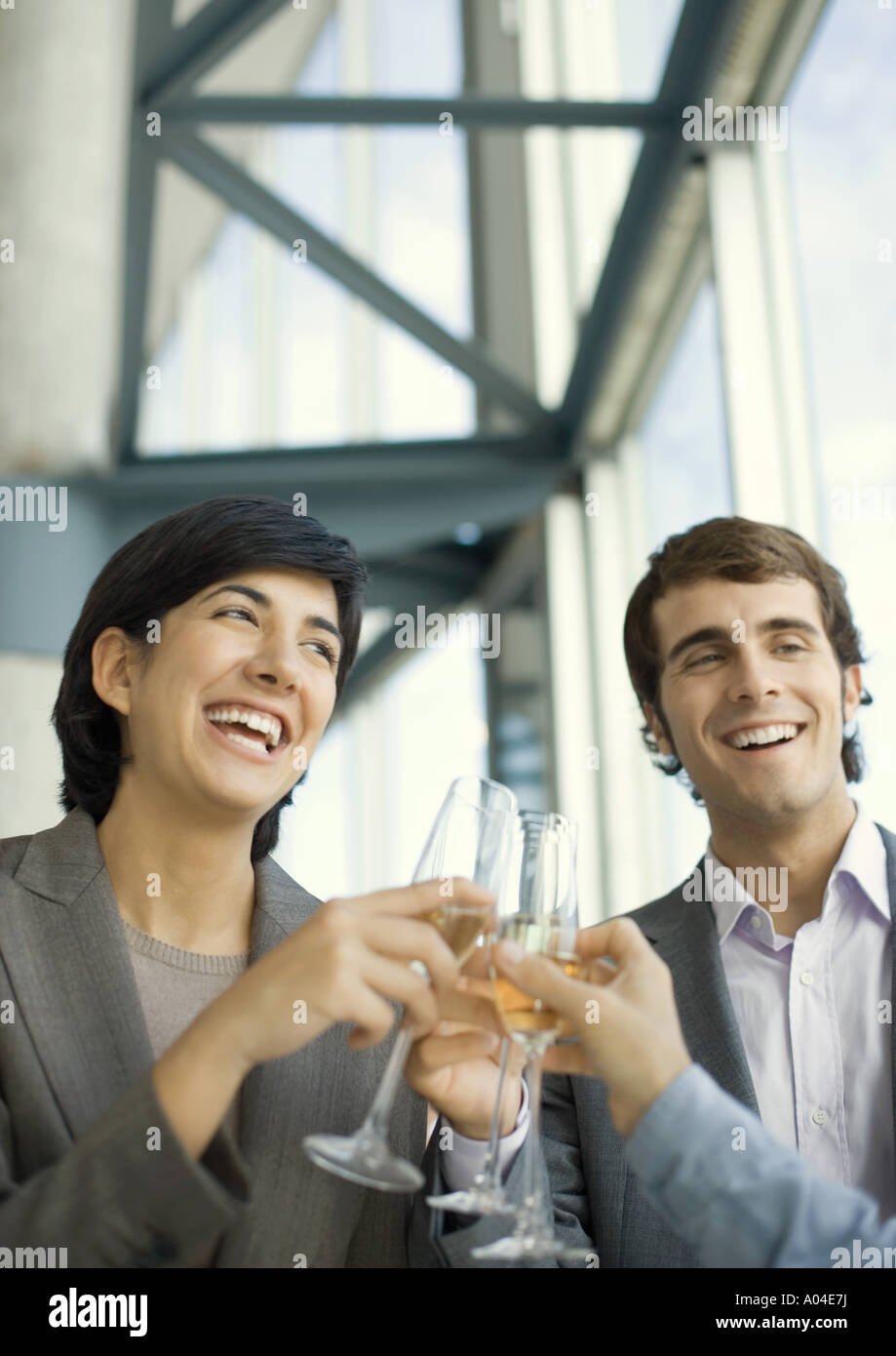 Businessmen clinking glasses hi-res stock photography and images - Alamy