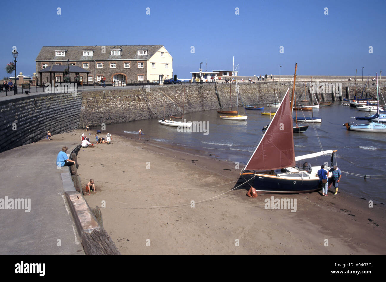 Minehead seafront stone harbour sea wall & promenade summer blue sky ...
