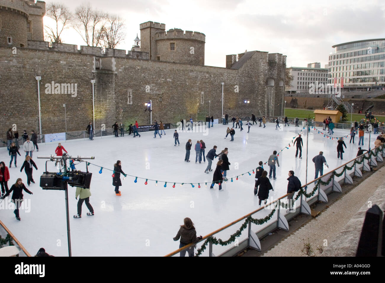 Ice skating in the moat at the tower of london hi-res stock photography ...