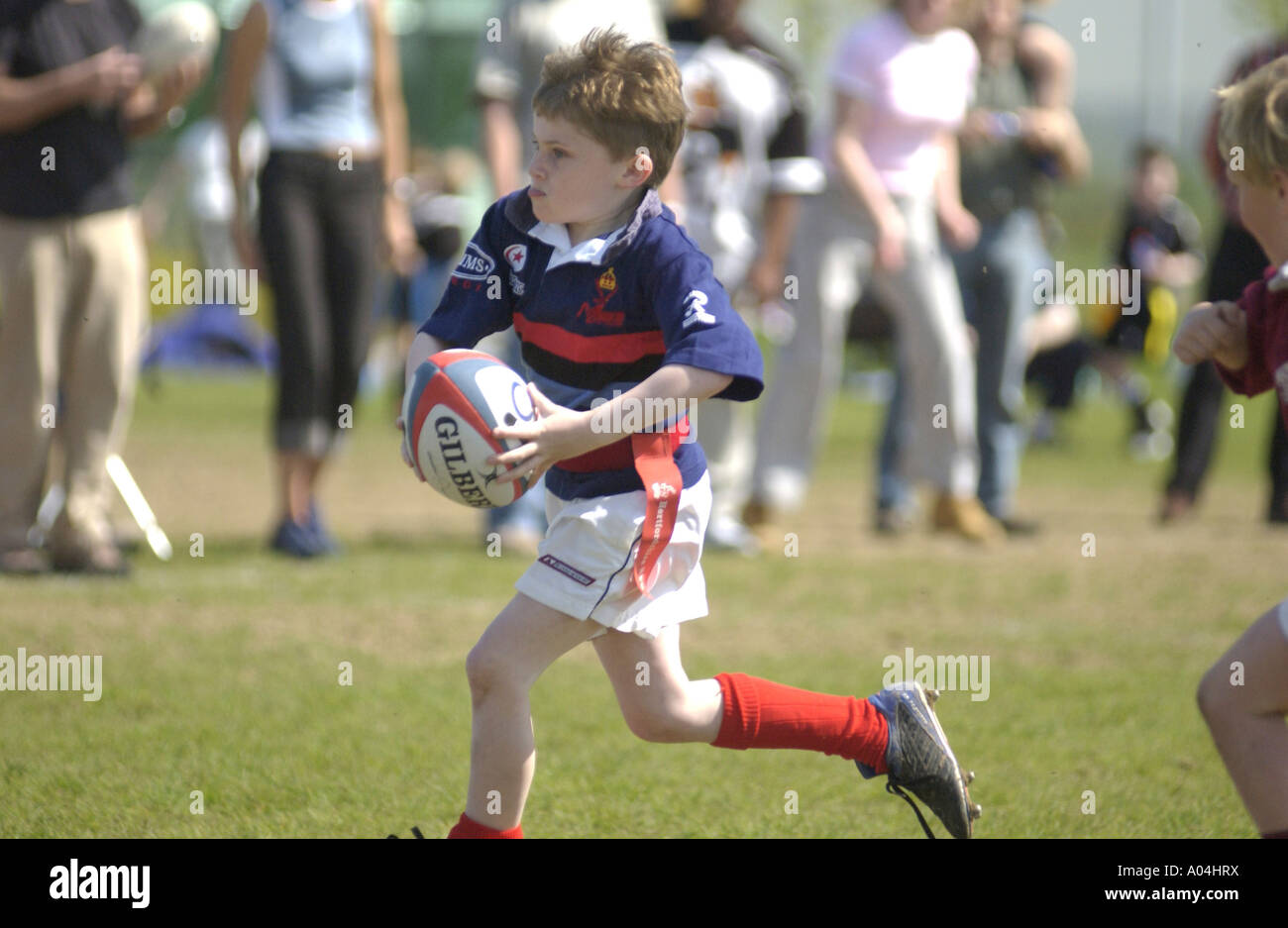 Kids playing rugby hi-res stock photography and images - Alamy