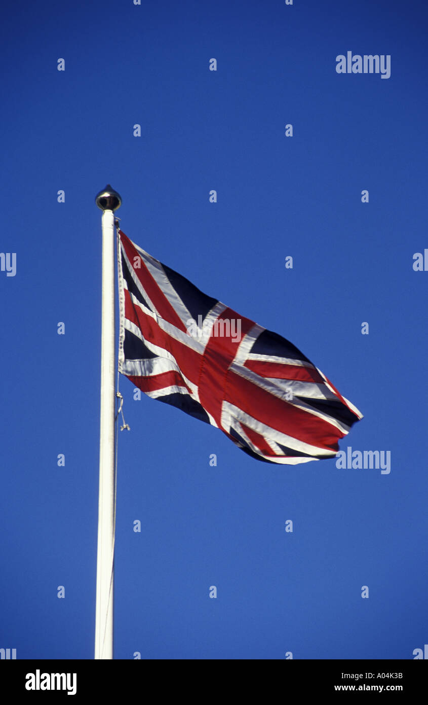 Union Jack on a white flagpole Stock Photo - Alamy