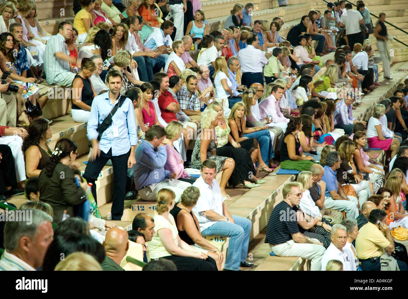 Sitting crowd communication watching hi-res stock photography and ...