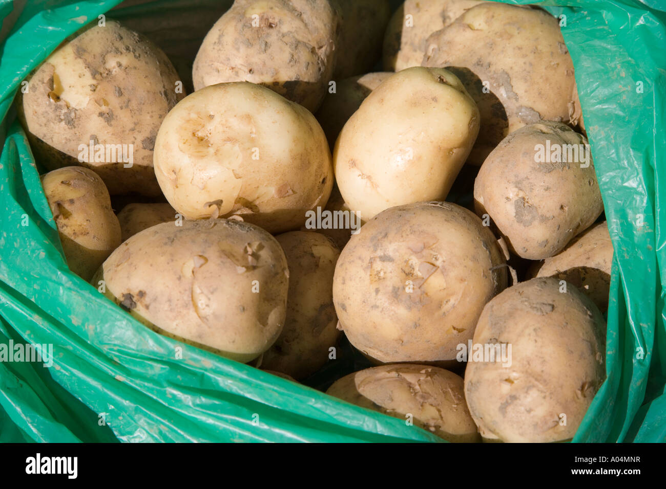 Potatoes in plastic bag hi-res stock photography and images - Alamy