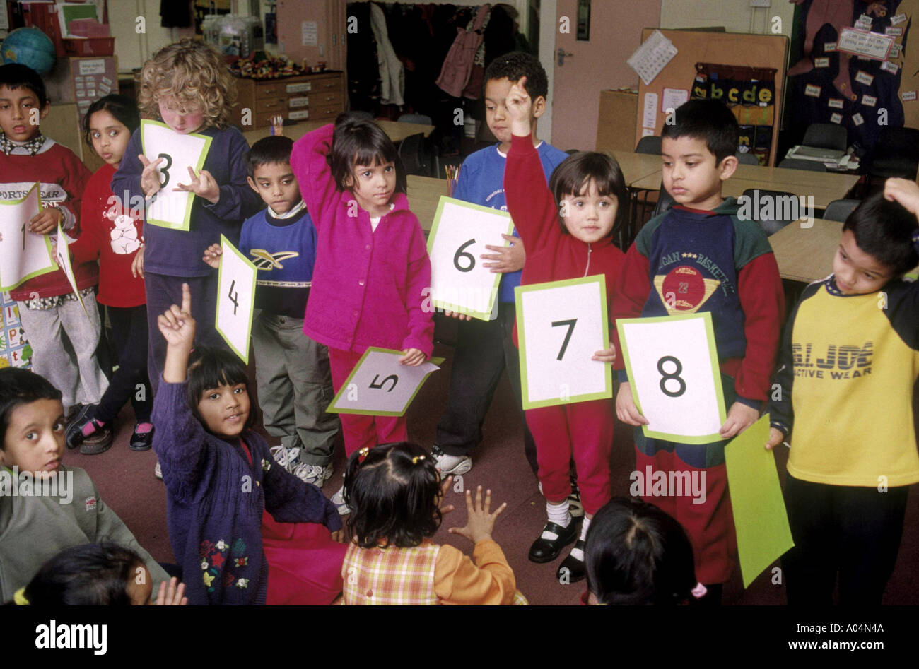reception class of 4 to 5 year olds working with numbers Stock Photo ...