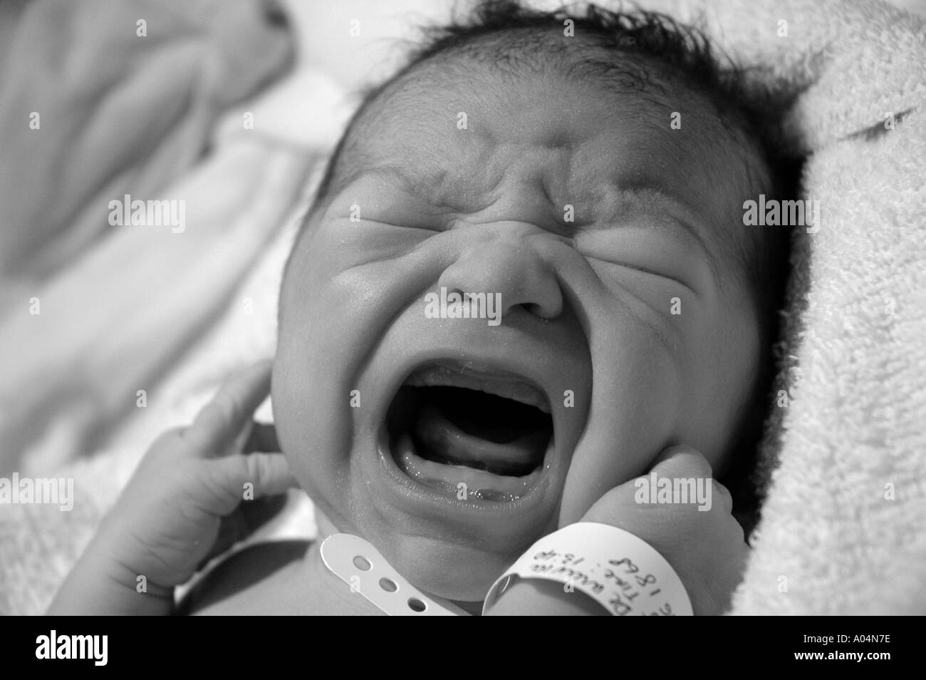 newborn baby screaming Stock Photo - Alamy