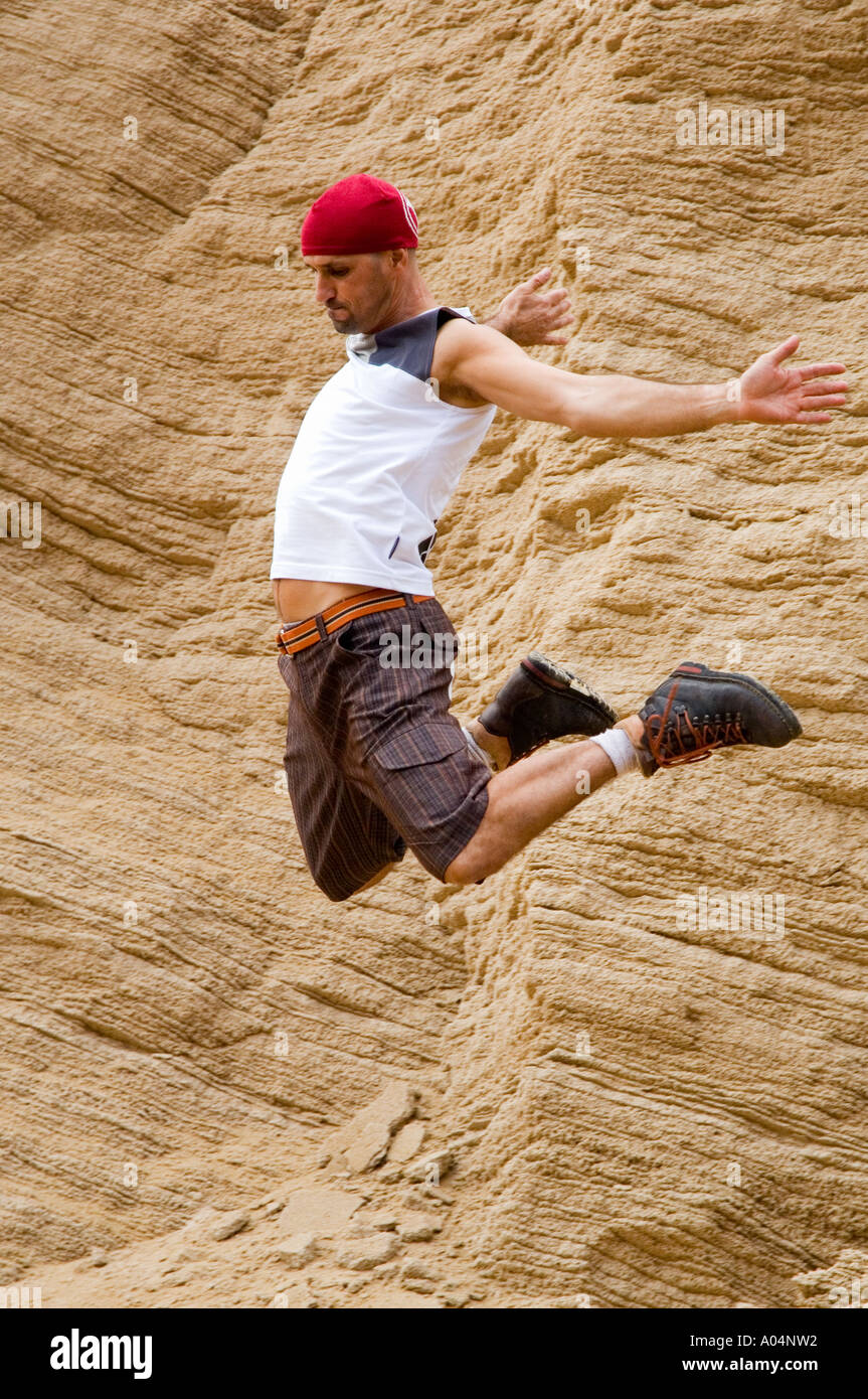 Man jumping from a rock hi-res stock photography and images - Alamy