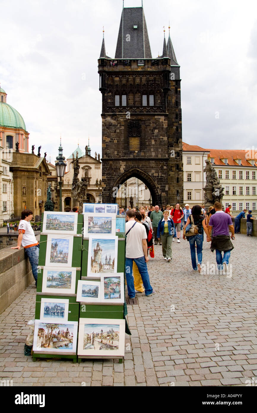Crowds and artists on the famous Charles Bridge of tourist city of ...