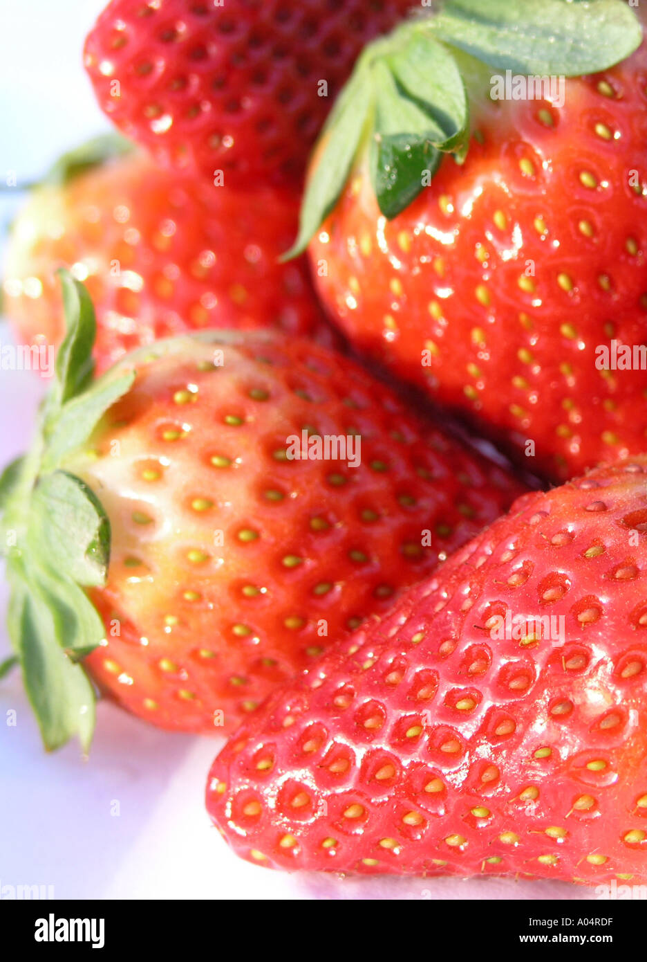 Red strawberries in yellow Cut Out Stock Images & Pictures - Alamy